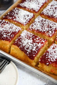 Jammy Coconut Traybake - Jane's Patisserie