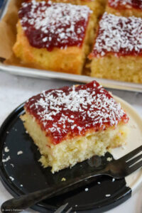 Jammy Coconut Traybake - Jane's Patisserie